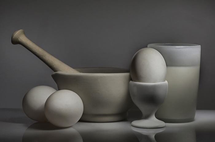 Light-painted still-life images lit with diffused torchlight